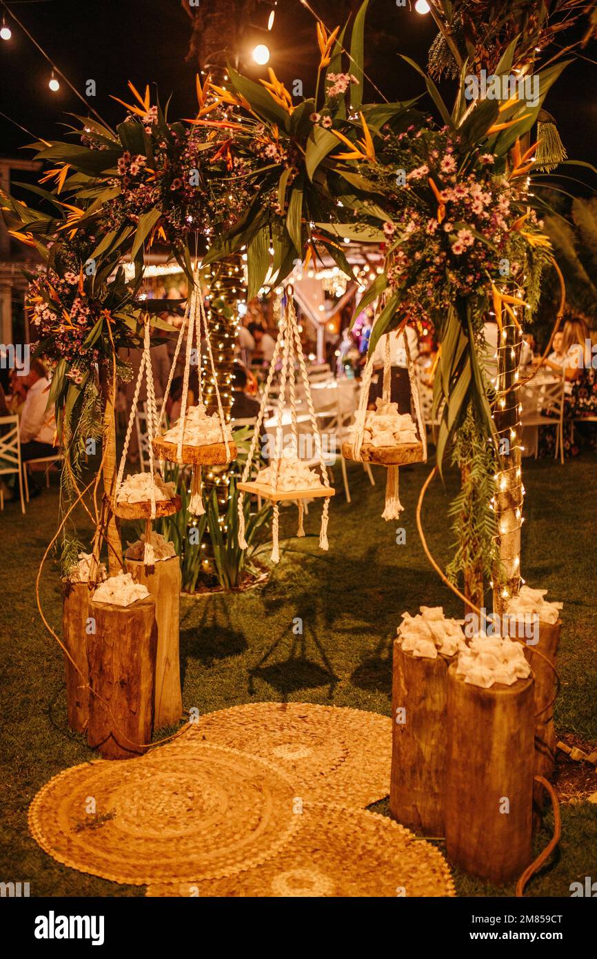 An outdoor event with a lot of plants and decorations Stock Photo - Alamy