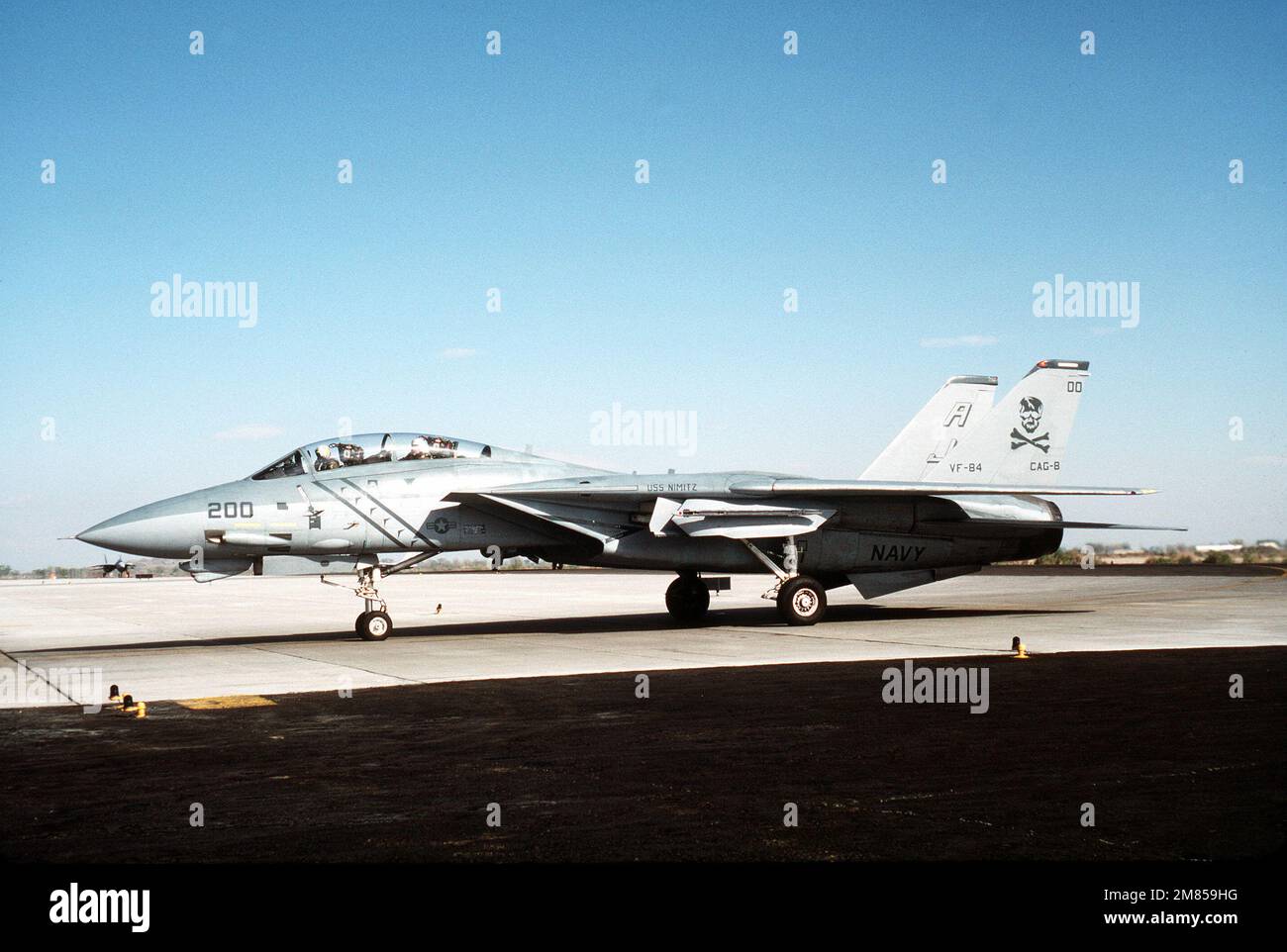 A left side view of a Fighter Squadron 84 (VF-84) F-14A Tomcat aircraft ...