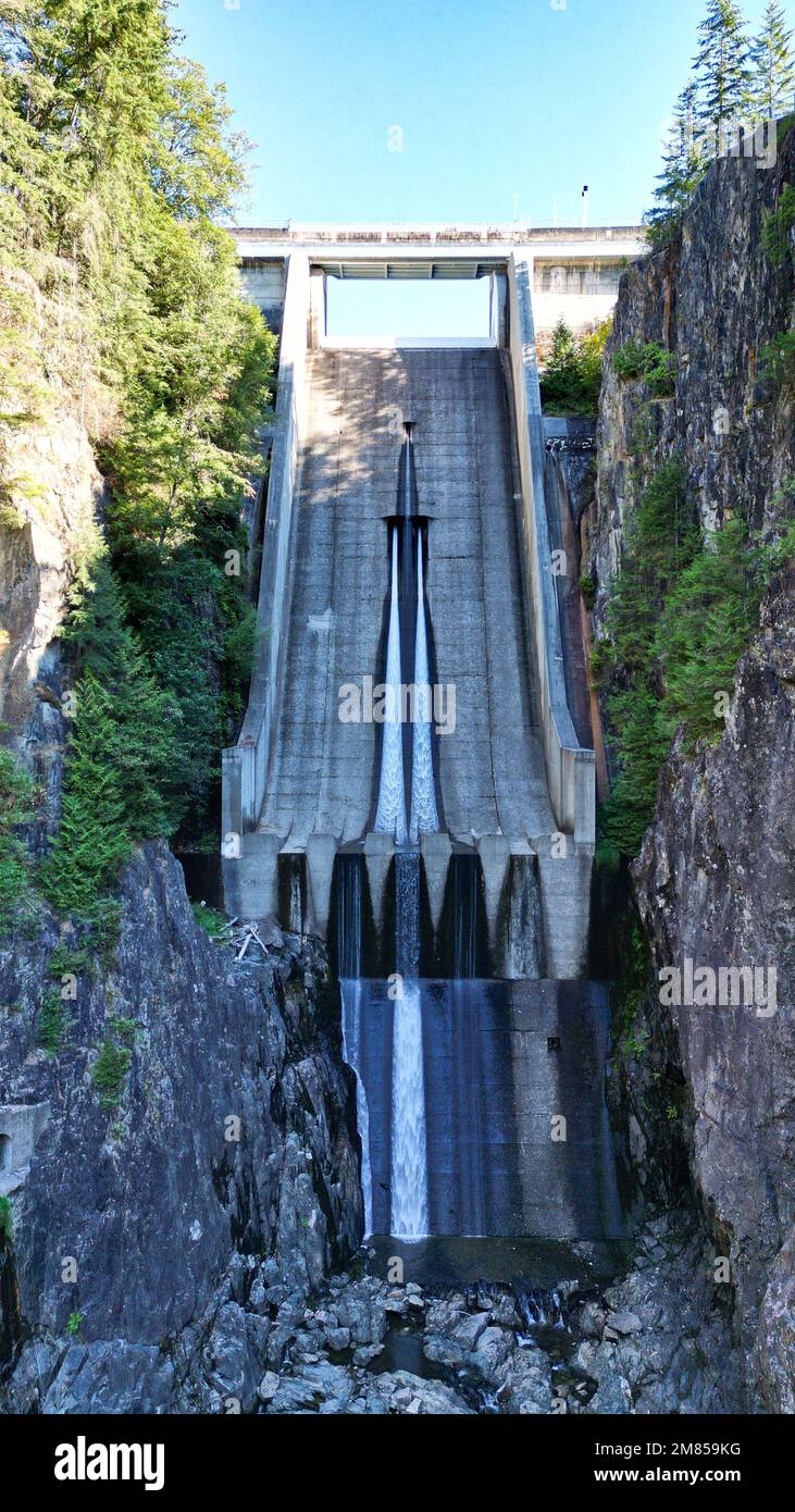 A vertical shot of Cleveland Dam in Capilano River Regional Park, BC ...