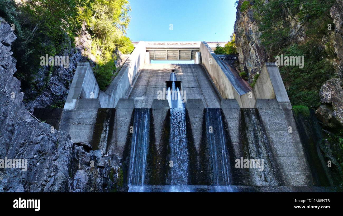 A low-angle shot of Cleveland Dam in Capilano River Regional Park, BC ...