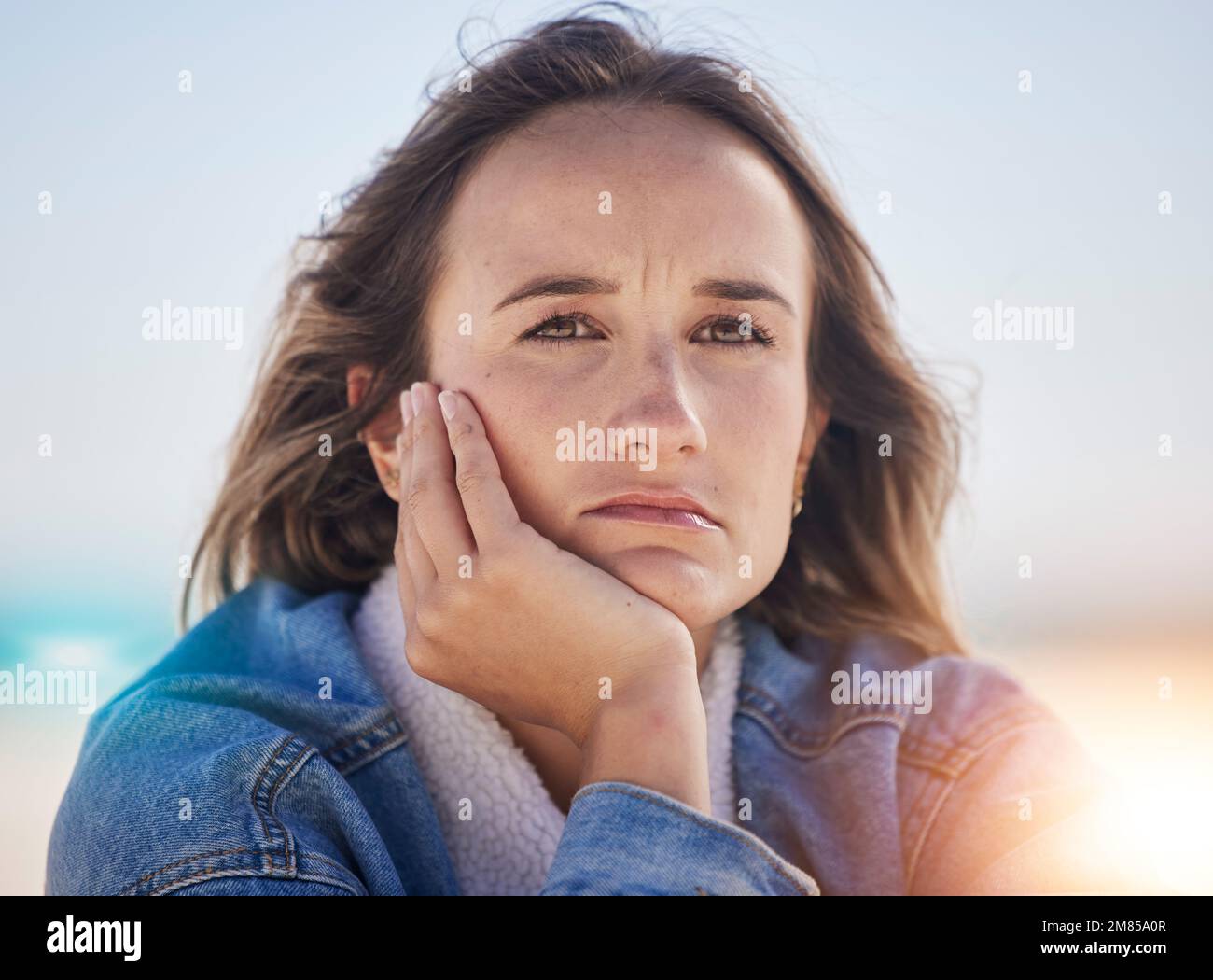 Woman beach sad hi-res stock photography and images - Alamy