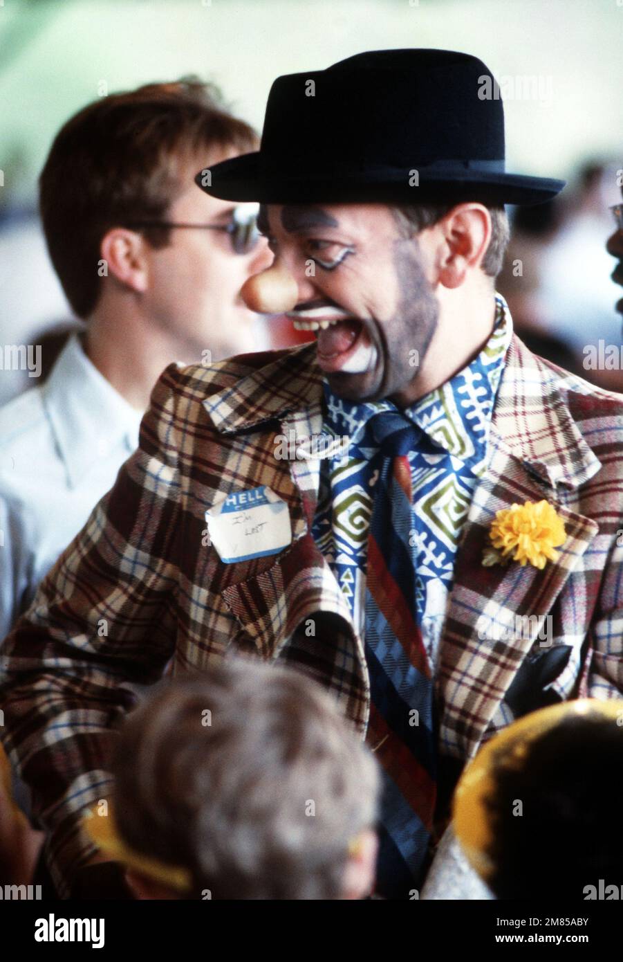 TSGT David C. Johnson masquerades as "D.C. the Clown" to entertain ...