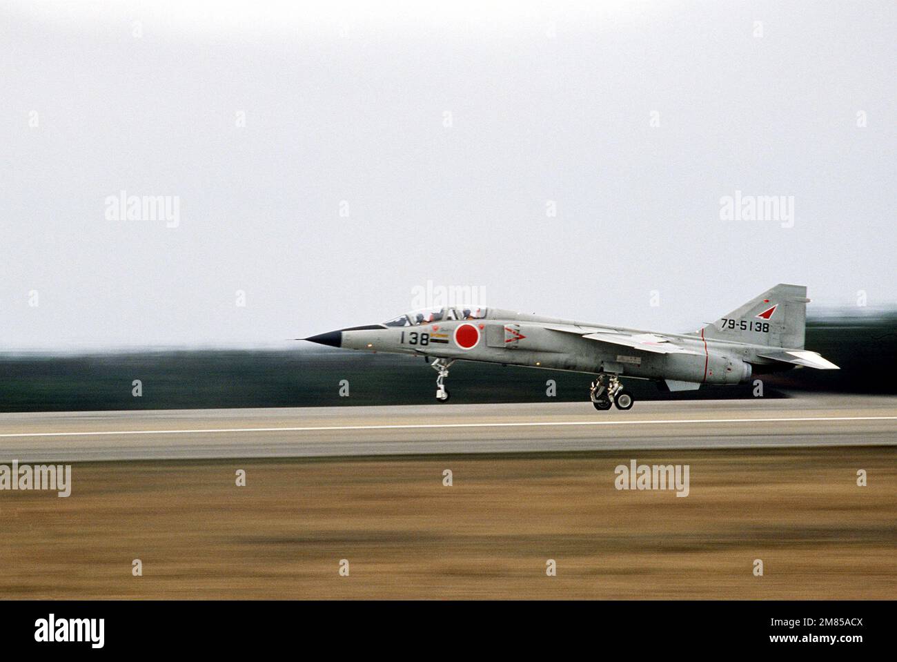 A Japanese Air Self Defense Force T-2 aircraft takes off during the ...
