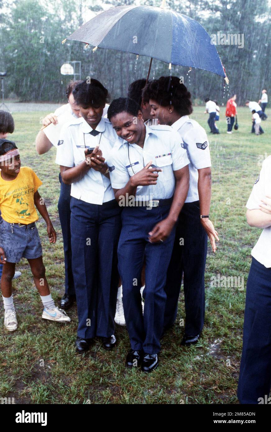 A1C Rose Johnson, AIC Bernie Brown and SGT Michele Taylor take cover ...