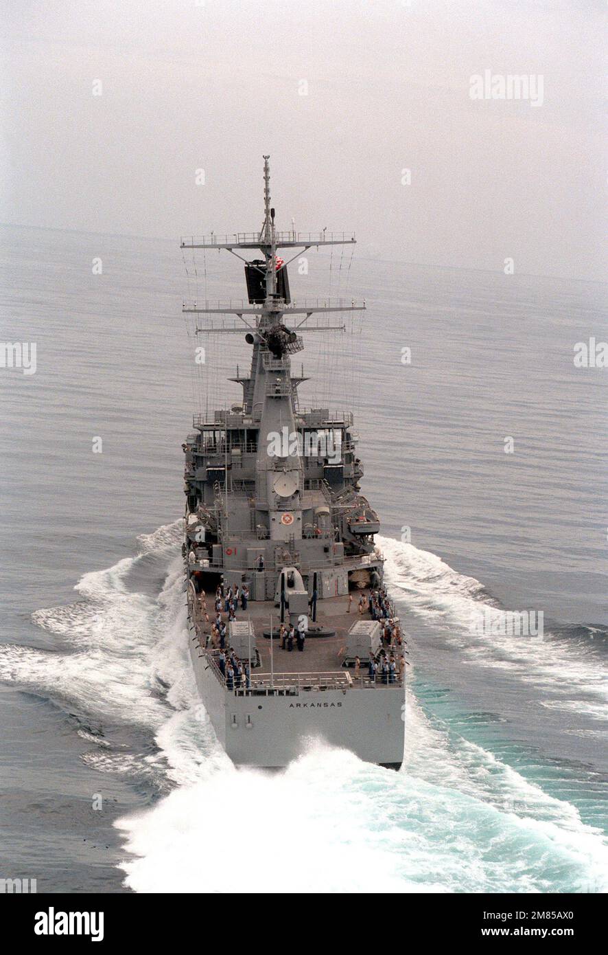 A stern view of the nuclear-powered guided missile cruiser USS ARKANSAS ...