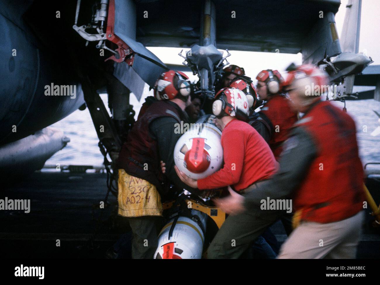 Aviation ordnancemen aboard the aircraft carrier USS CORAL SEA (CV-43 ...