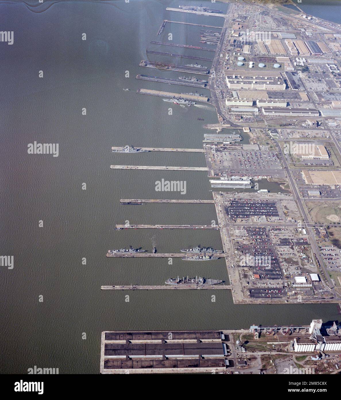 An aerial view of piers. (SUBSTANDARD IMAGE). Base: Naval Station ...
