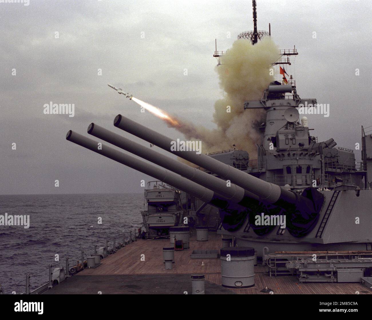 The battleship USS IOWA (BB-61) launches a Harpoon anti-ship cruise ...
