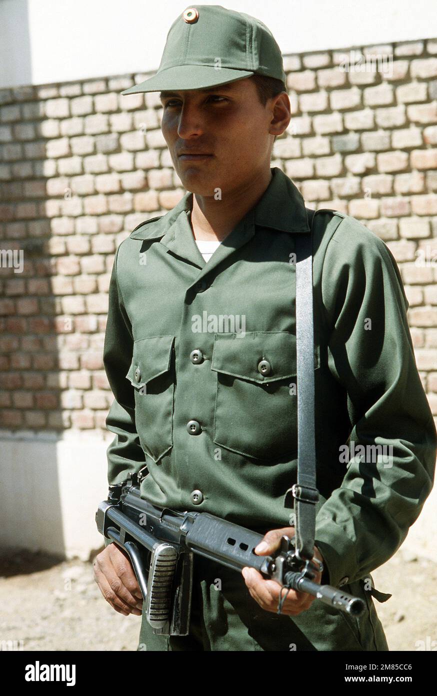 A Bolivian soldier armed with a Belgian-designed 7.62 FN FAL rifle ...