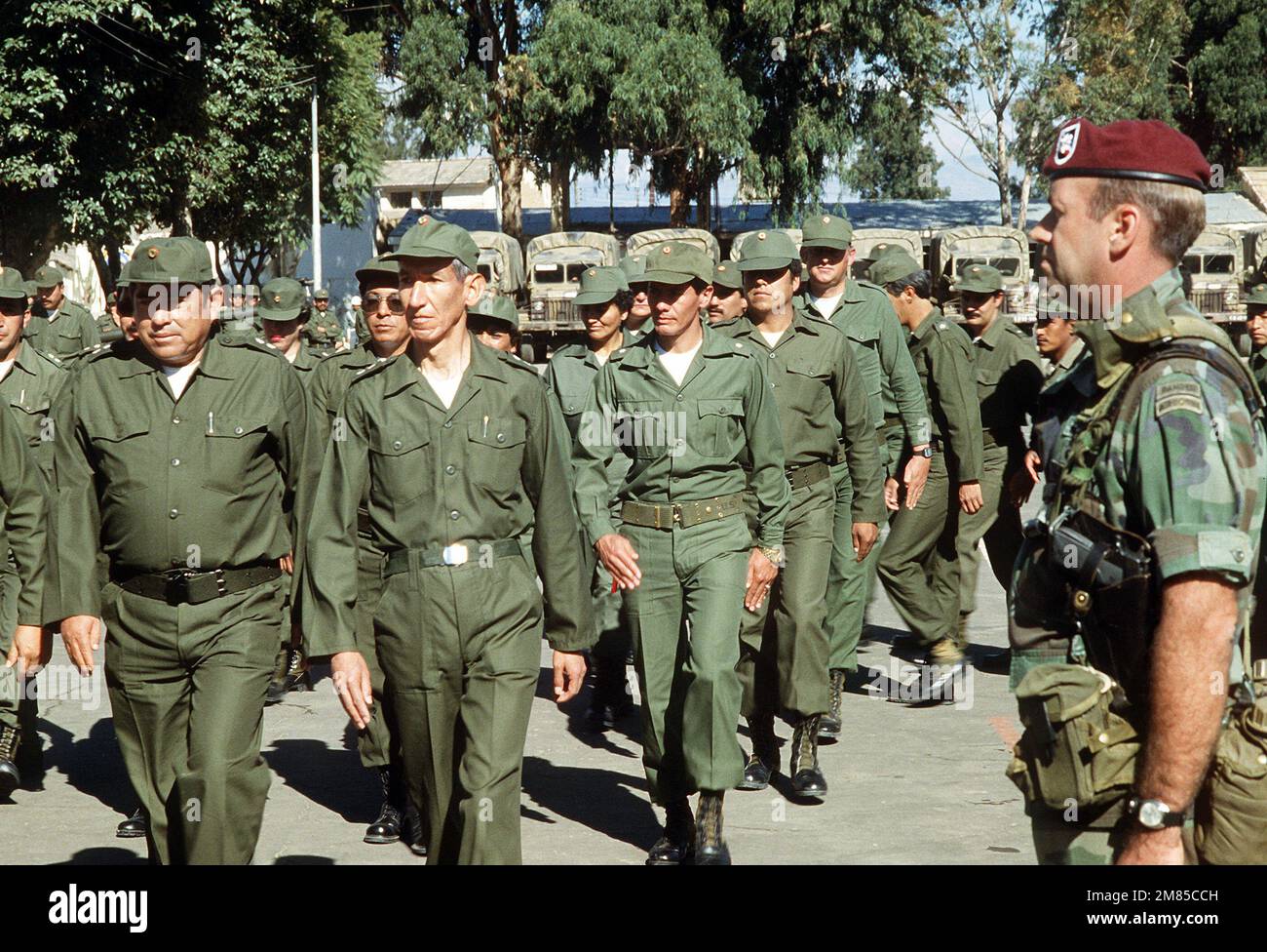 LT. COL. George Utter, commander, Joint Task Force, salutes as Bolivian ...