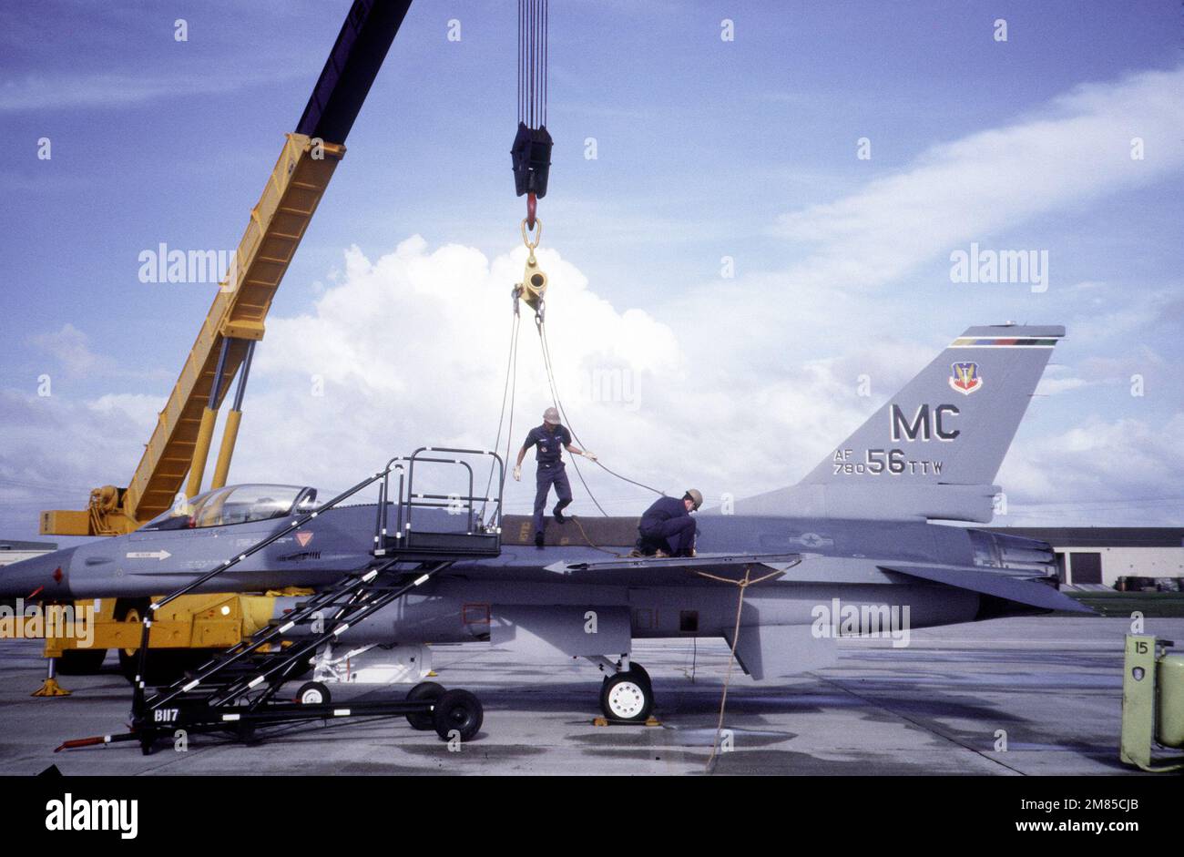 Members of the 56th Equipment Maintenance Squadron prepares an F-16A ...