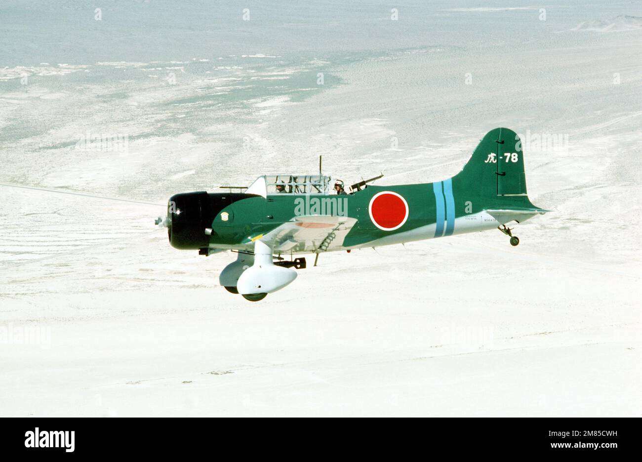A replica of a Japanese Val Type 99 bomber aircraft flies during a re ...