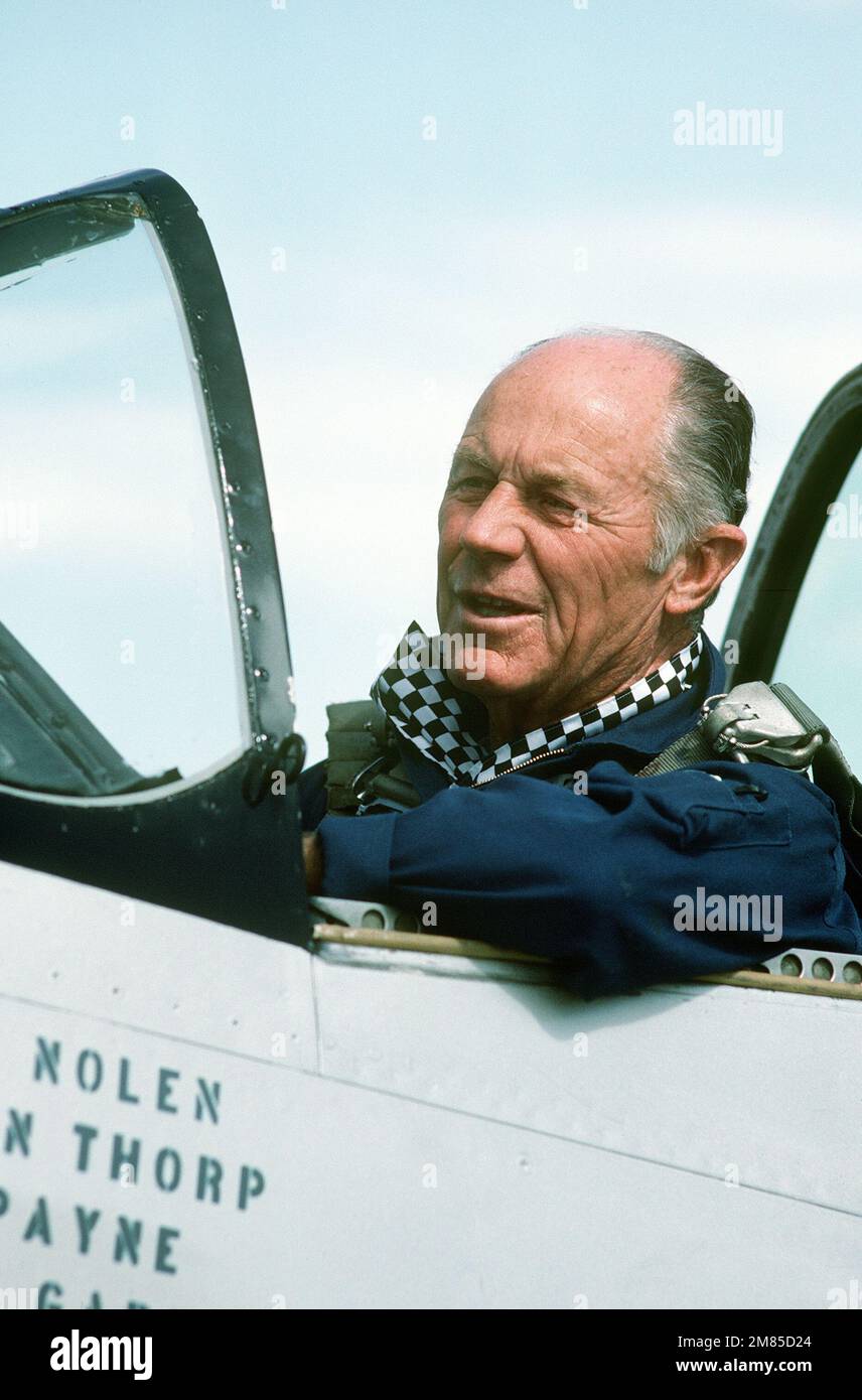 Retired Brig. GEN. Charles E. Yeager sits in the cockpit of a P-51 ...