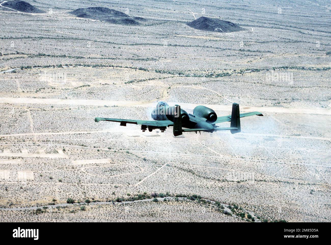 An air-to-air rear view of a 355th Tactical Training Squadron A-10 ...