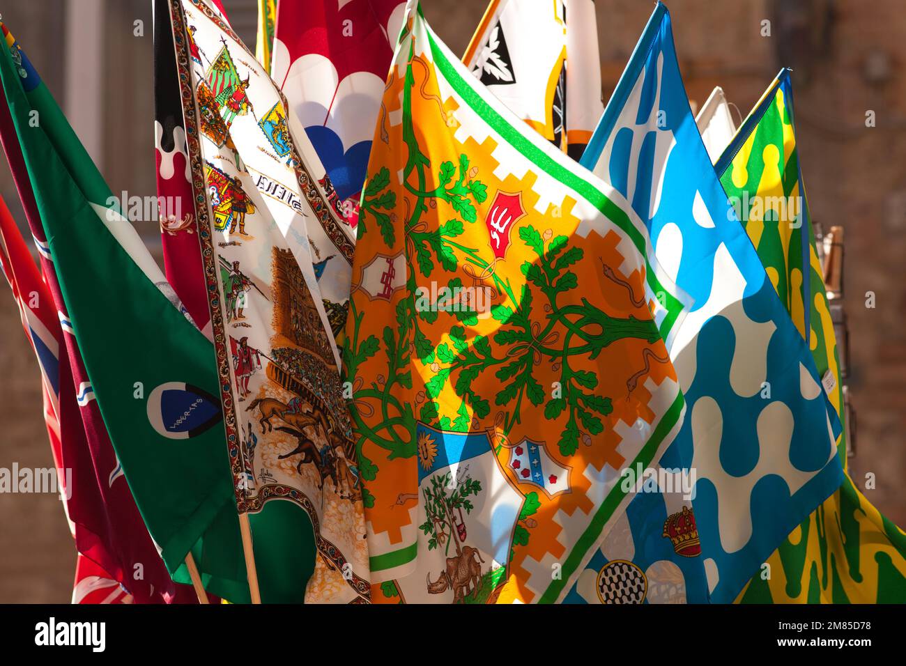 SIENA, ITALY ON AUGUST 27, 2014.Colorful banners of the Contrade, flags ...