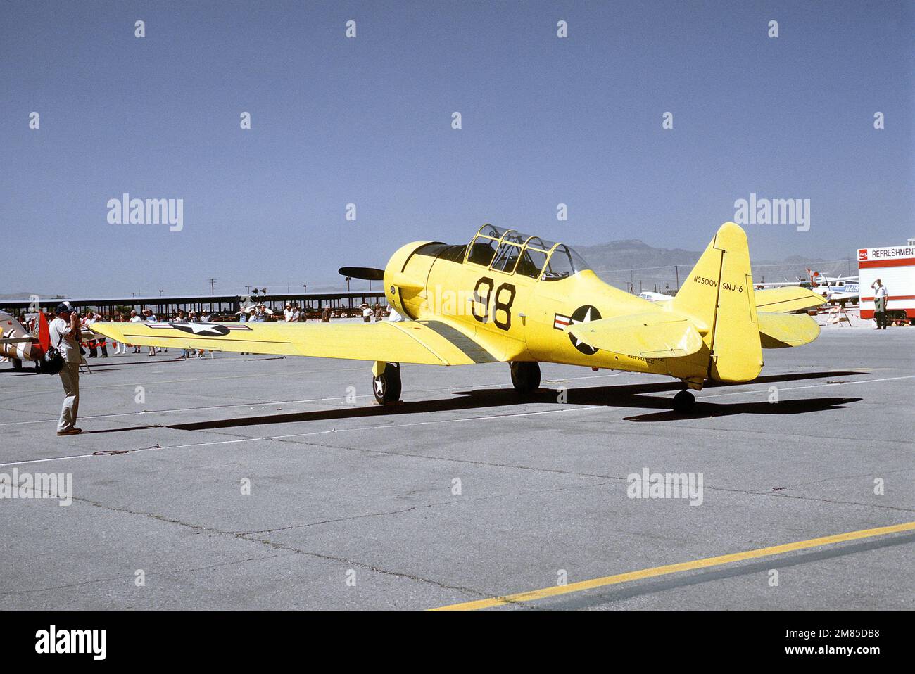 Three quarter rear view of a North American built SNJ "Texan" aircraft ...