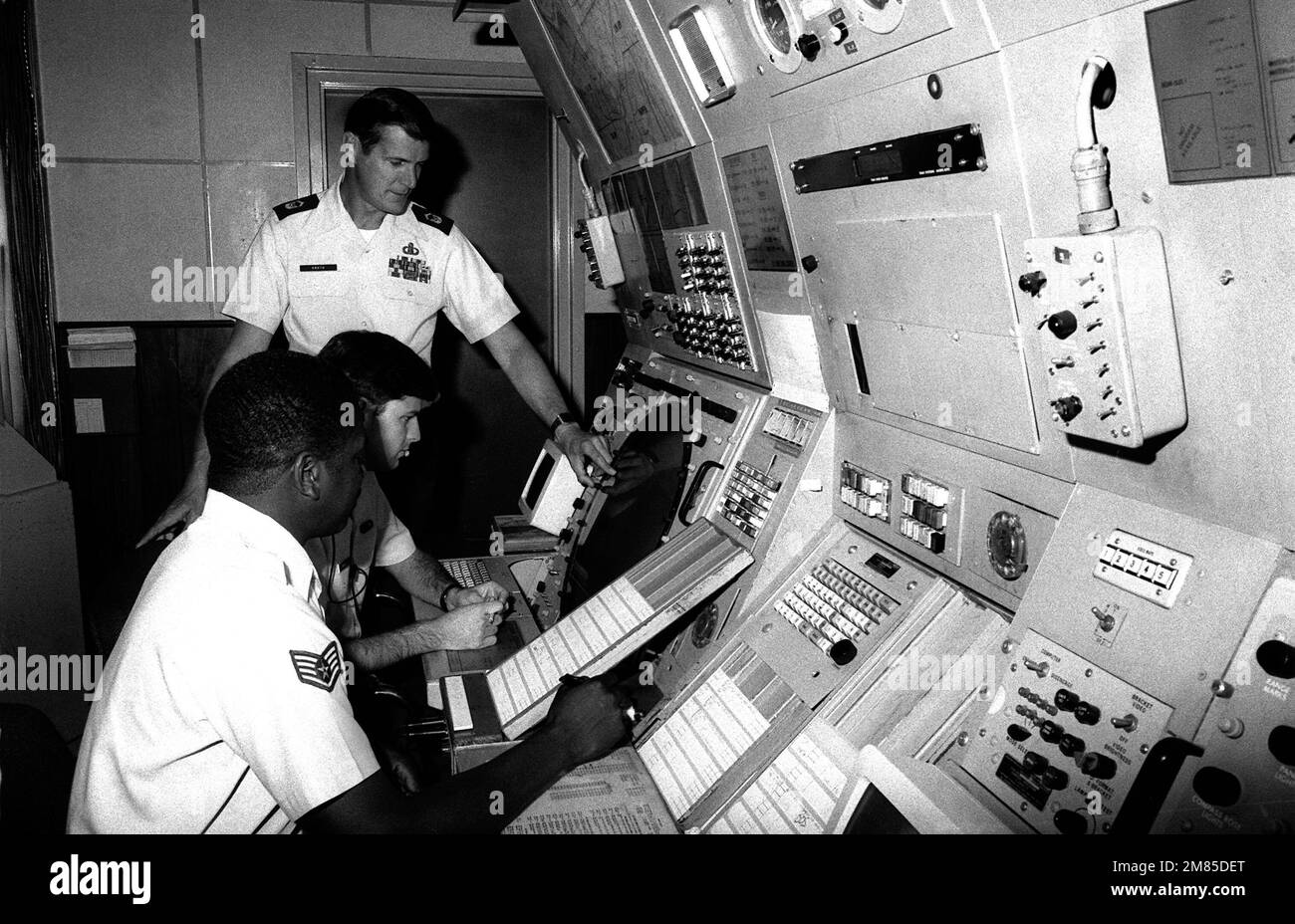 CHIEF MASTER Sergeant Frederick E. Knuth, front, radar approach control ...
