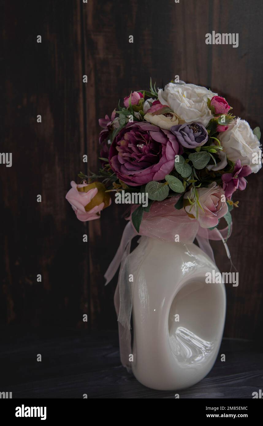 İncredible bouquet of pink and wite roses in vase on the black ...