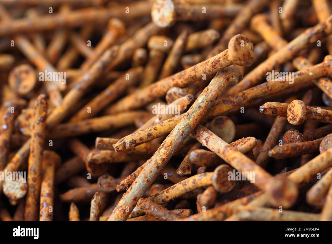 background pile of rusty nails in a warehouse Stock Photo - Alamy