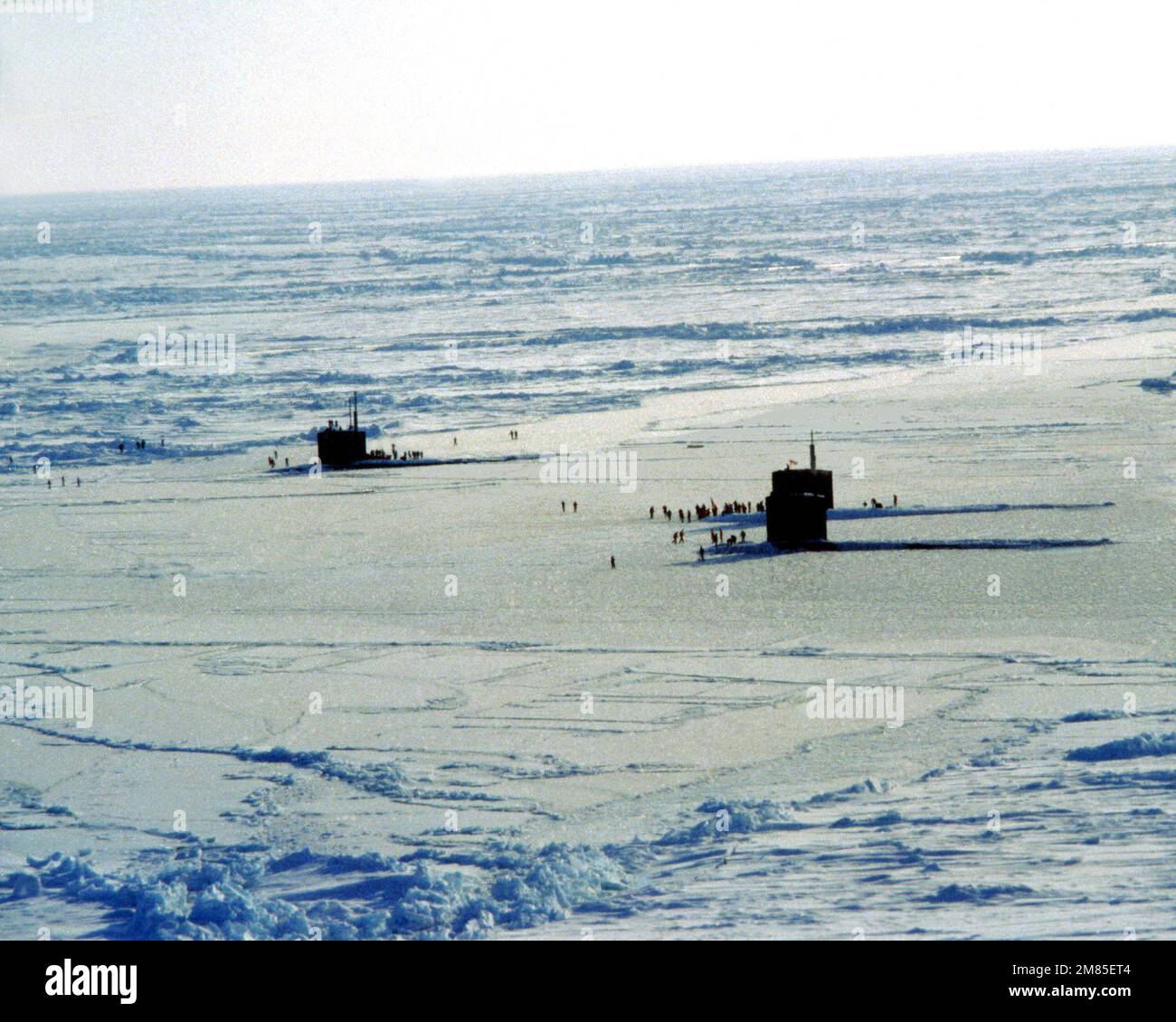 An elevated view of the attack submarines USS RAY (SSN-653), USS ...