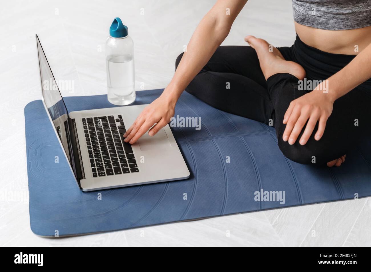 Close up young fit sporty woman wears sportswear search online fitness ...