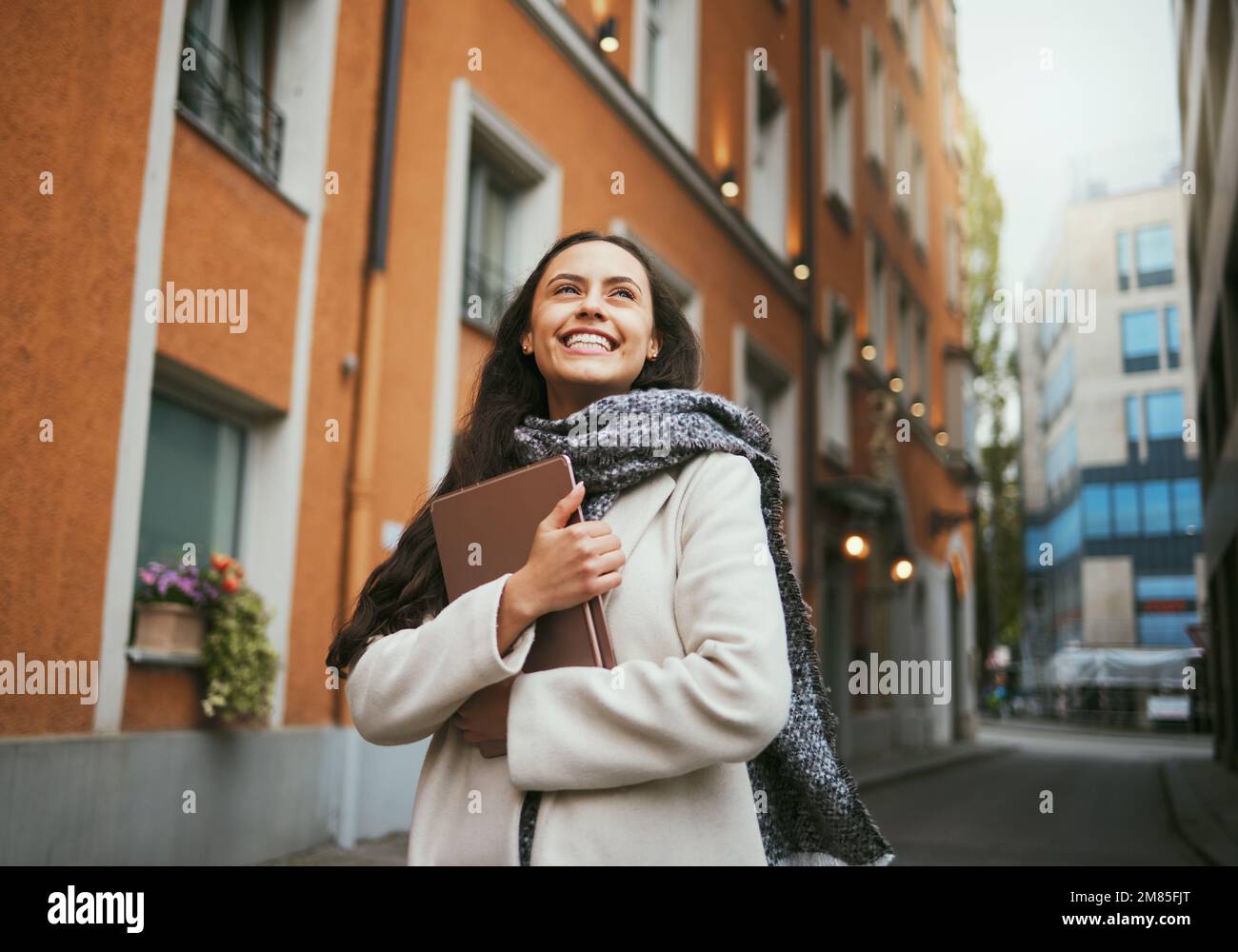 Travel, tourist and book with a sightseeing woman in the city traveling ...