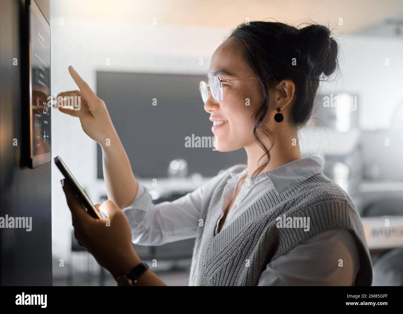 Smart home wall system, phone and woman with digital monitor for house automation, air ...