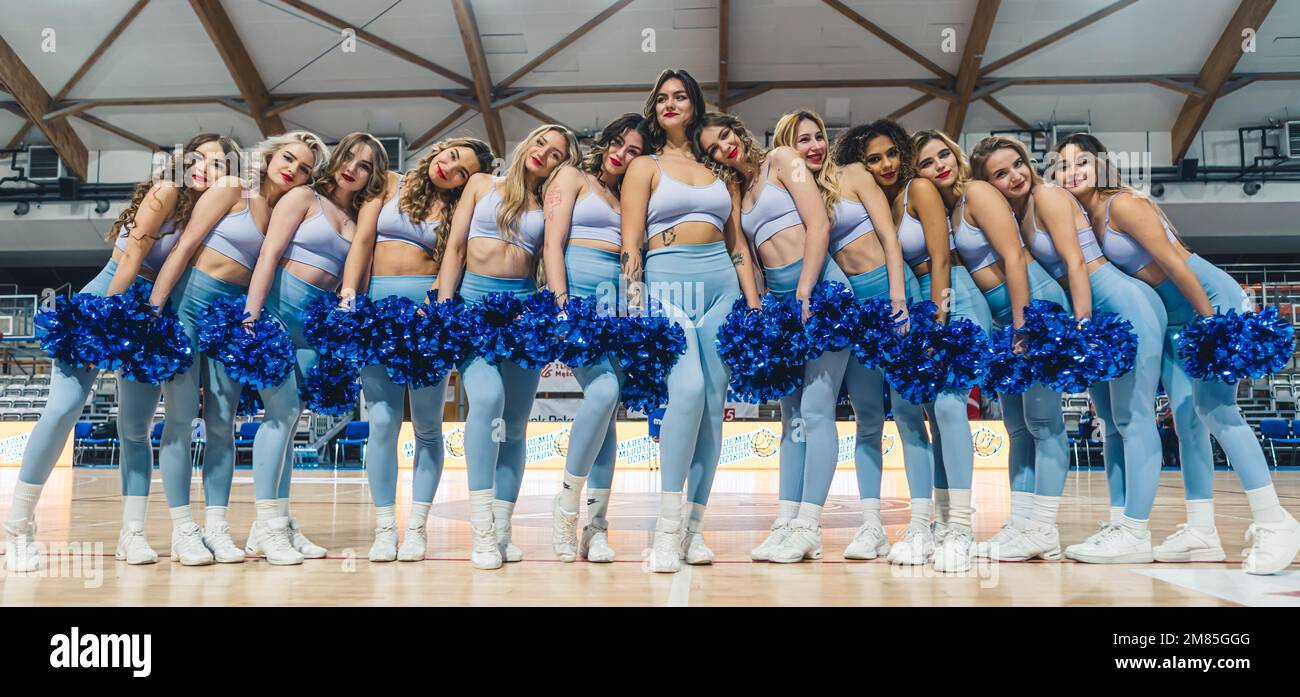 Cheerleaders Pose For The Camera Before A Big Match Their Energetic