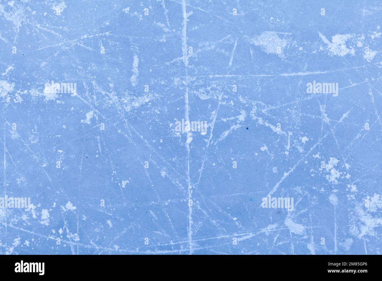 Empty ice rink with skate marks after the session outdoor. skating ice ...