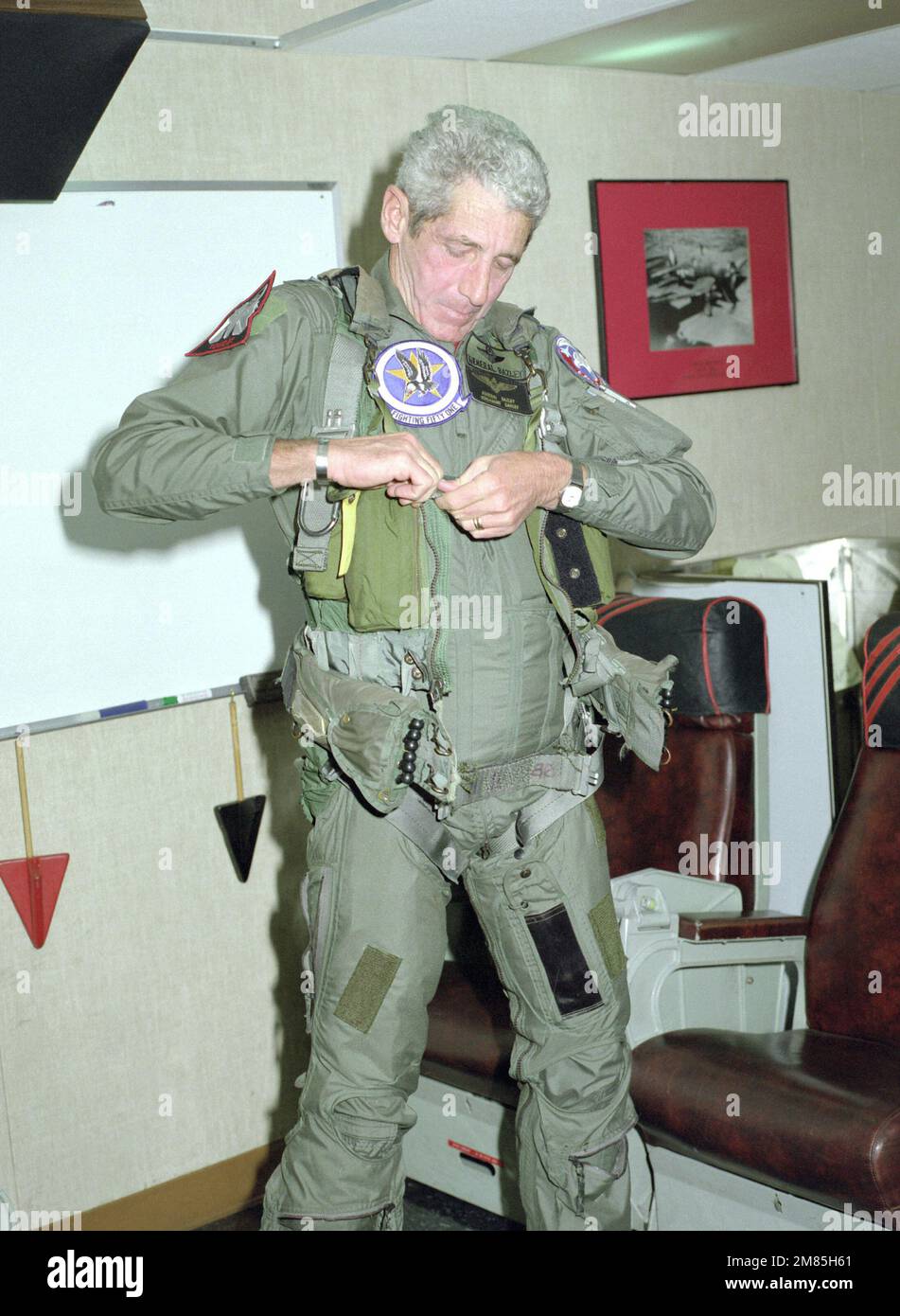 GEN. Robert W. Bazley, commander in chief, Pacific Air Forces, puts on ...
