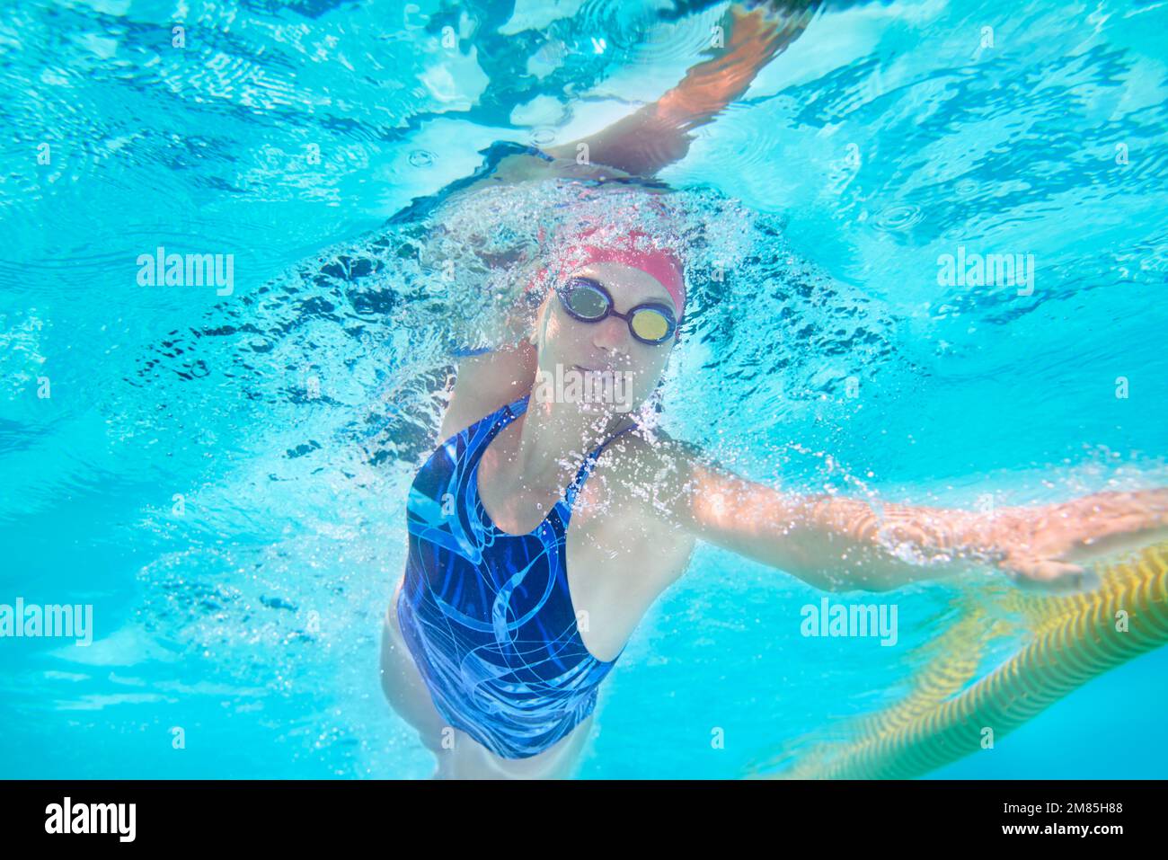 Underwater shot female swimmer swimming hi-res stock photography and ...