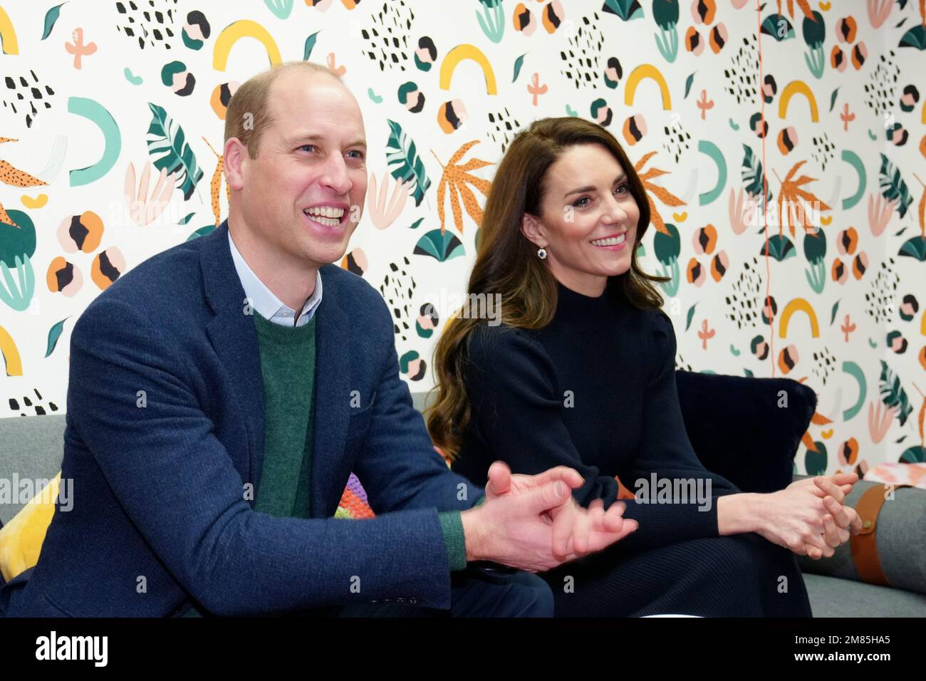 Britain's Kate, Princess of Wales, and Prince William listen to young ...