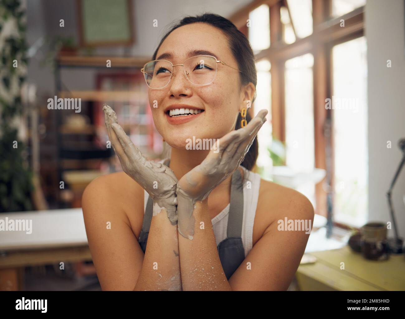 Happy young potter in glasses hi-res stock photography and images - Alamy
