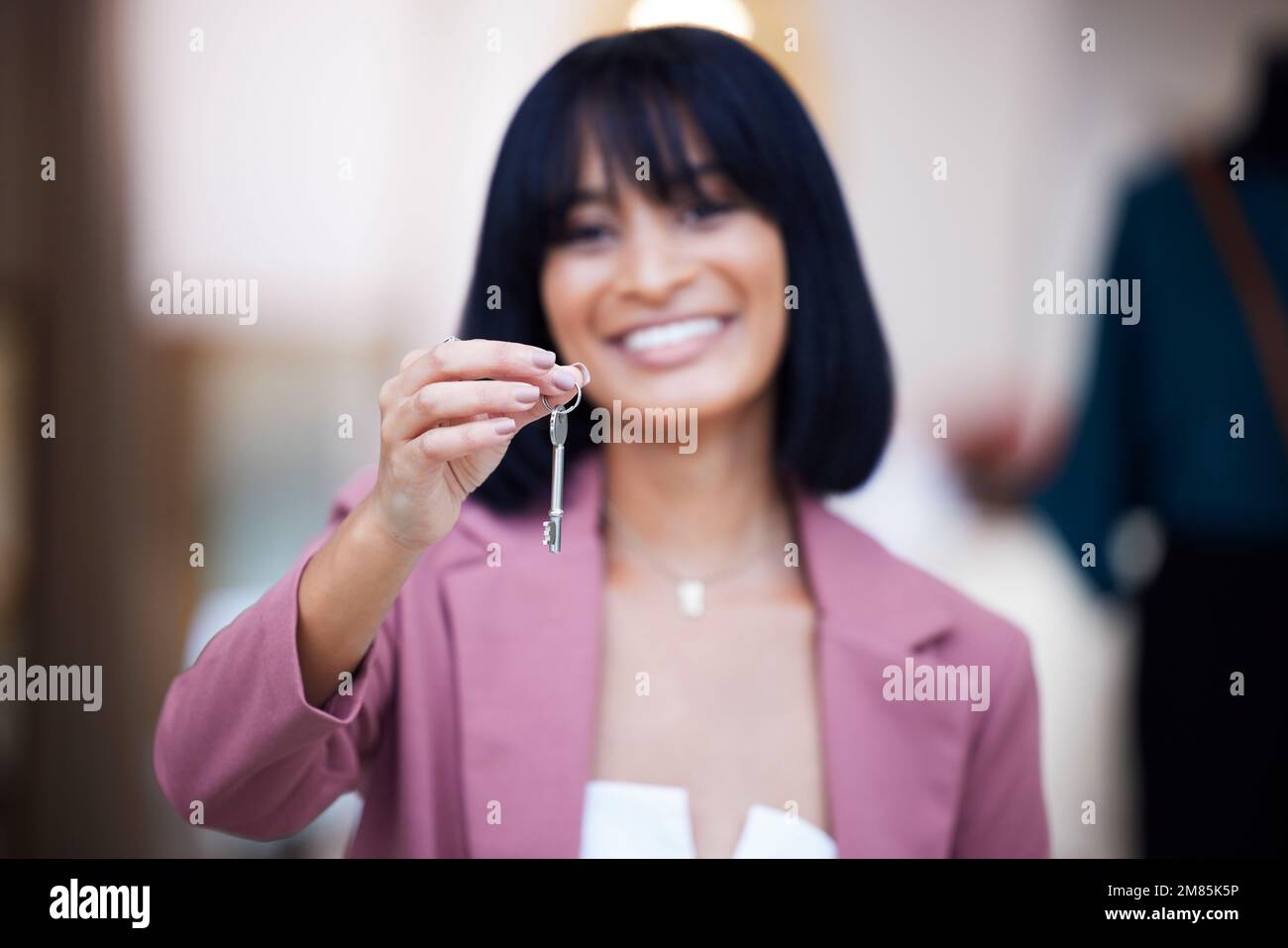 Woman, key and buying a new house, property or space for a small ...