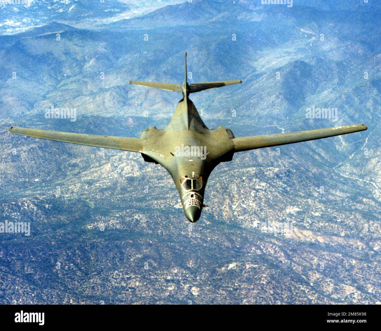 An air-to-air front view of a B-1B bomber during refueling/envelope ...