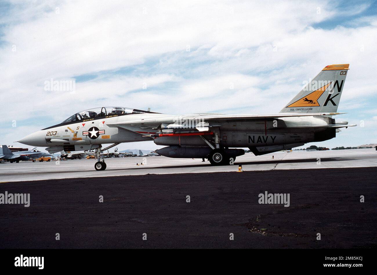 A left side view of a Fighter Squadron 21 (VF-21) F-14A Tomcat aircraft ...