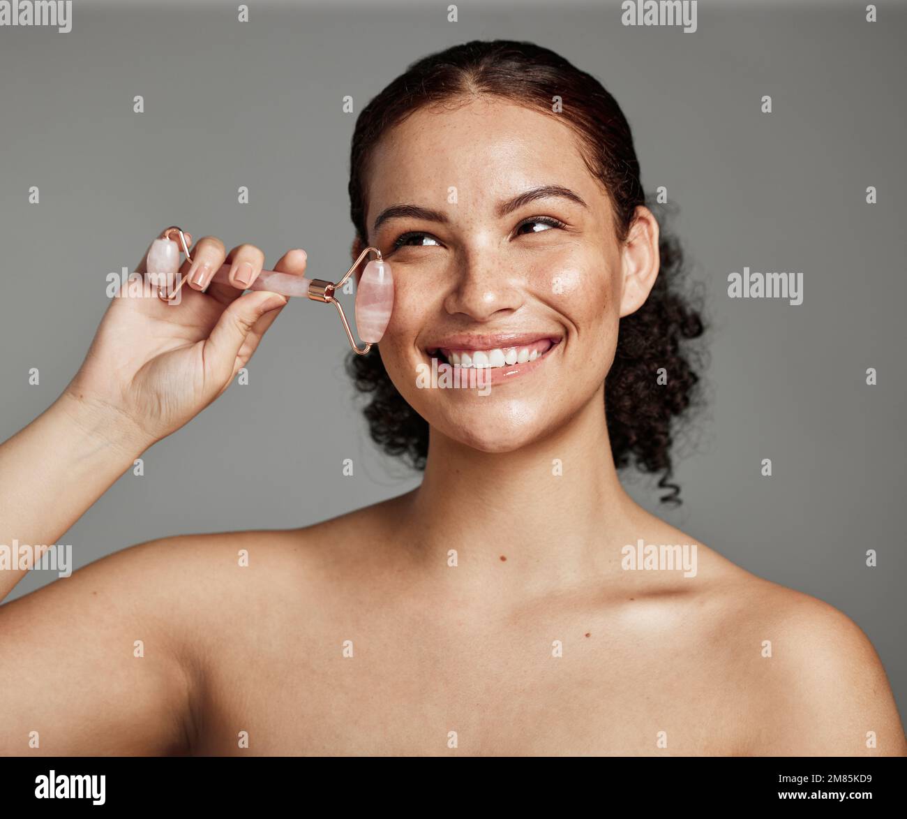 Woman, beauty and skincare with derma roller for anti aging face with ...