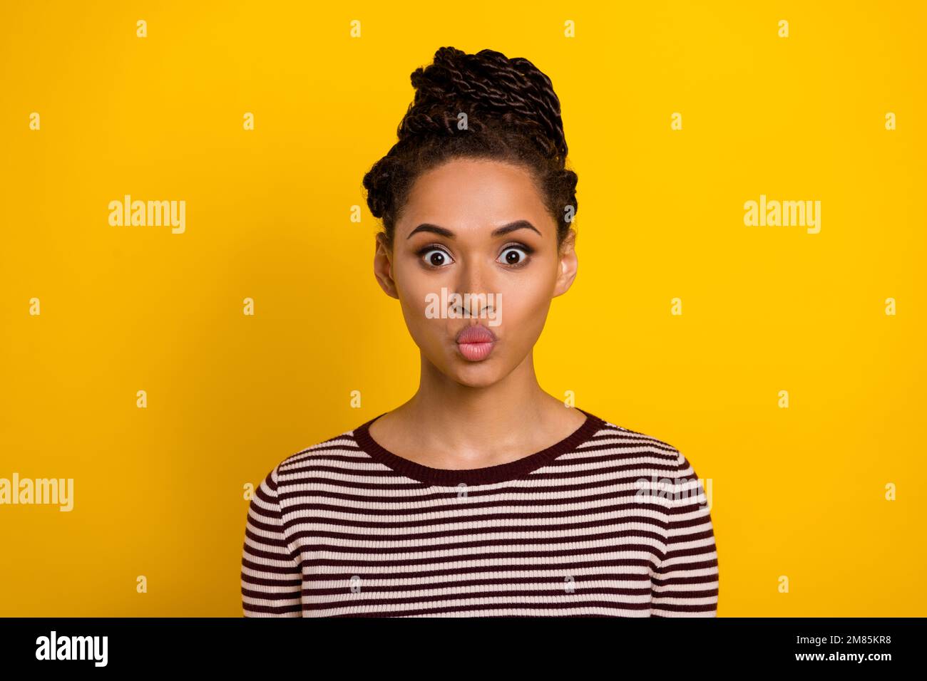 Portrait of pretty young lady pouted lips kiss look camera nice hairdo ...