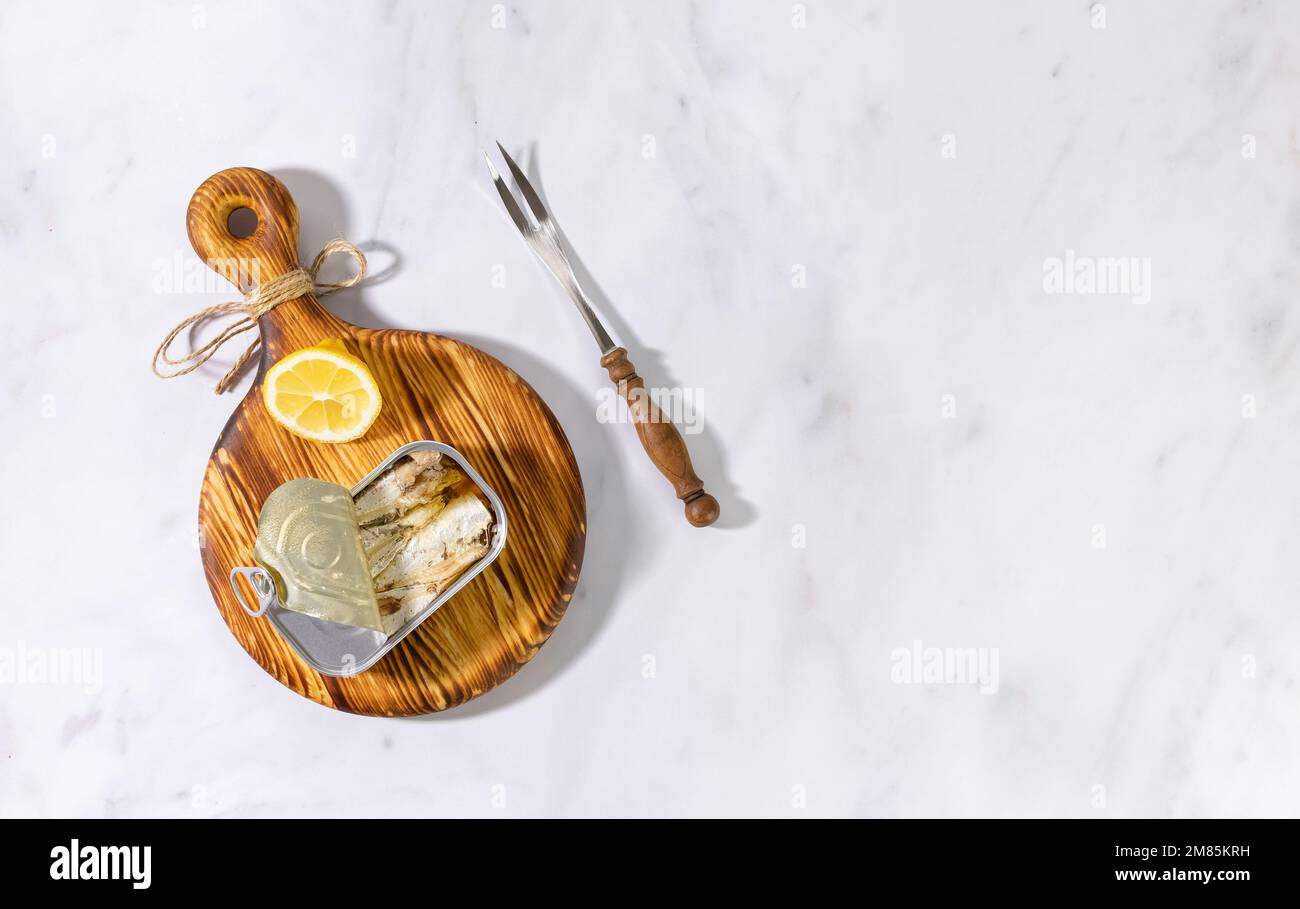 Tinned sardines board. Small tapas Stock Photo - Alamy