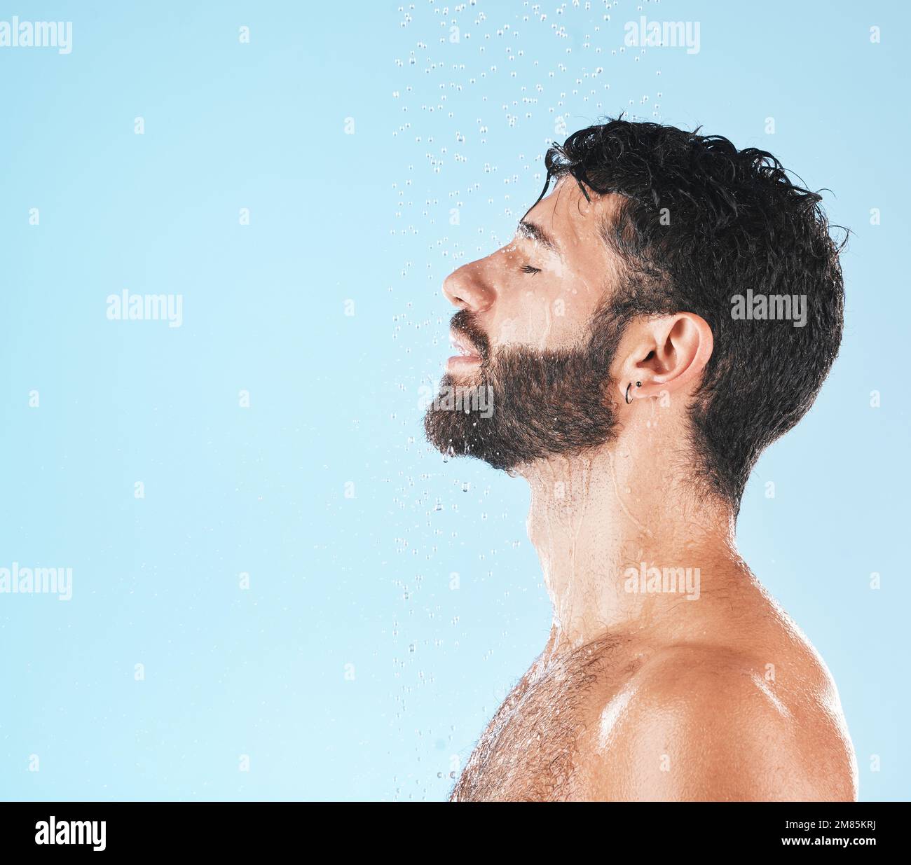 Water, cleaning and face with man and beauty, shower for hygiene and ...