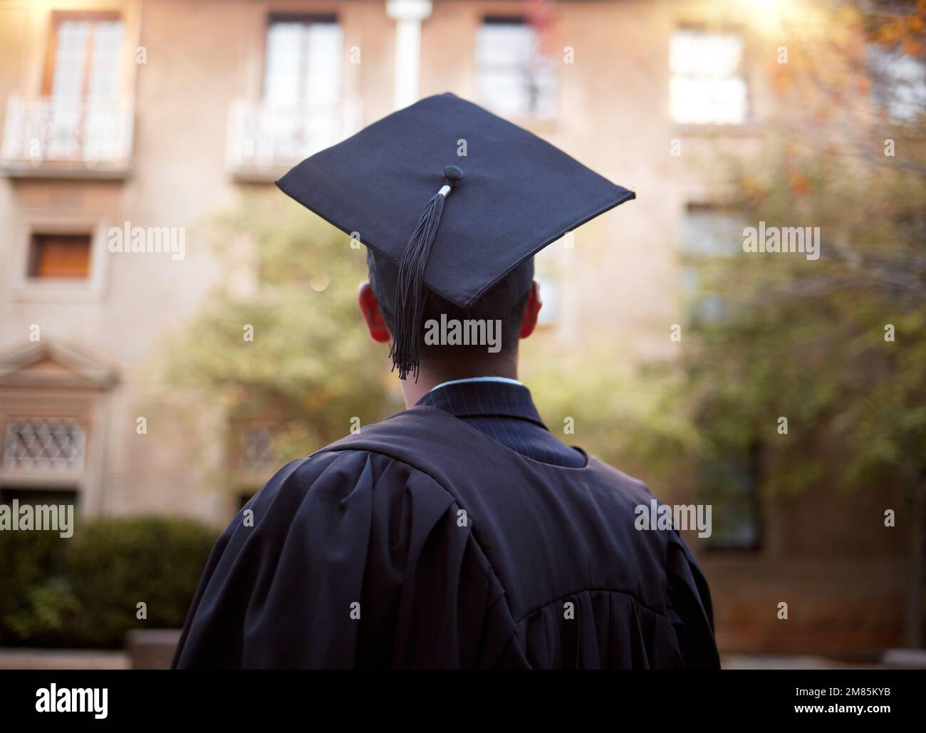 Thinking graduate, man or vision on university campus, college event or ...