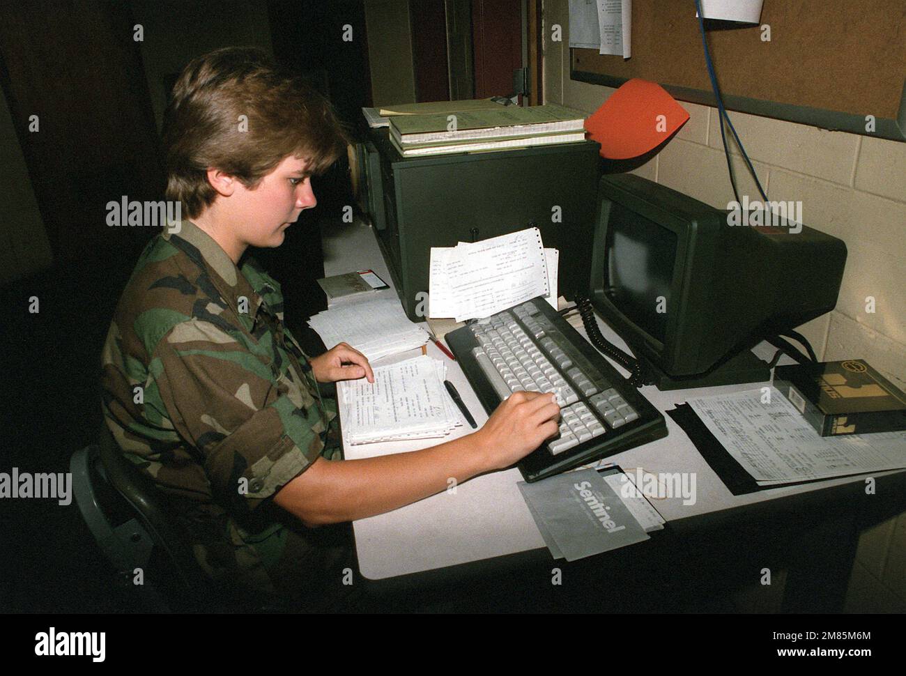 SPEC. 4 Sharon Reilly works at a Tactical Army Combat Support Computer ...
