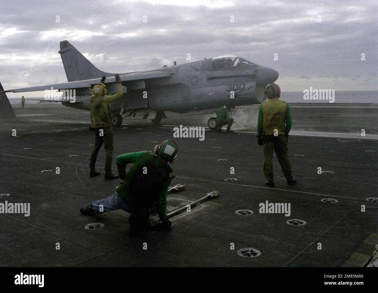 An A-7E Corsair II aircraft is positioned on a catapult during flight ...