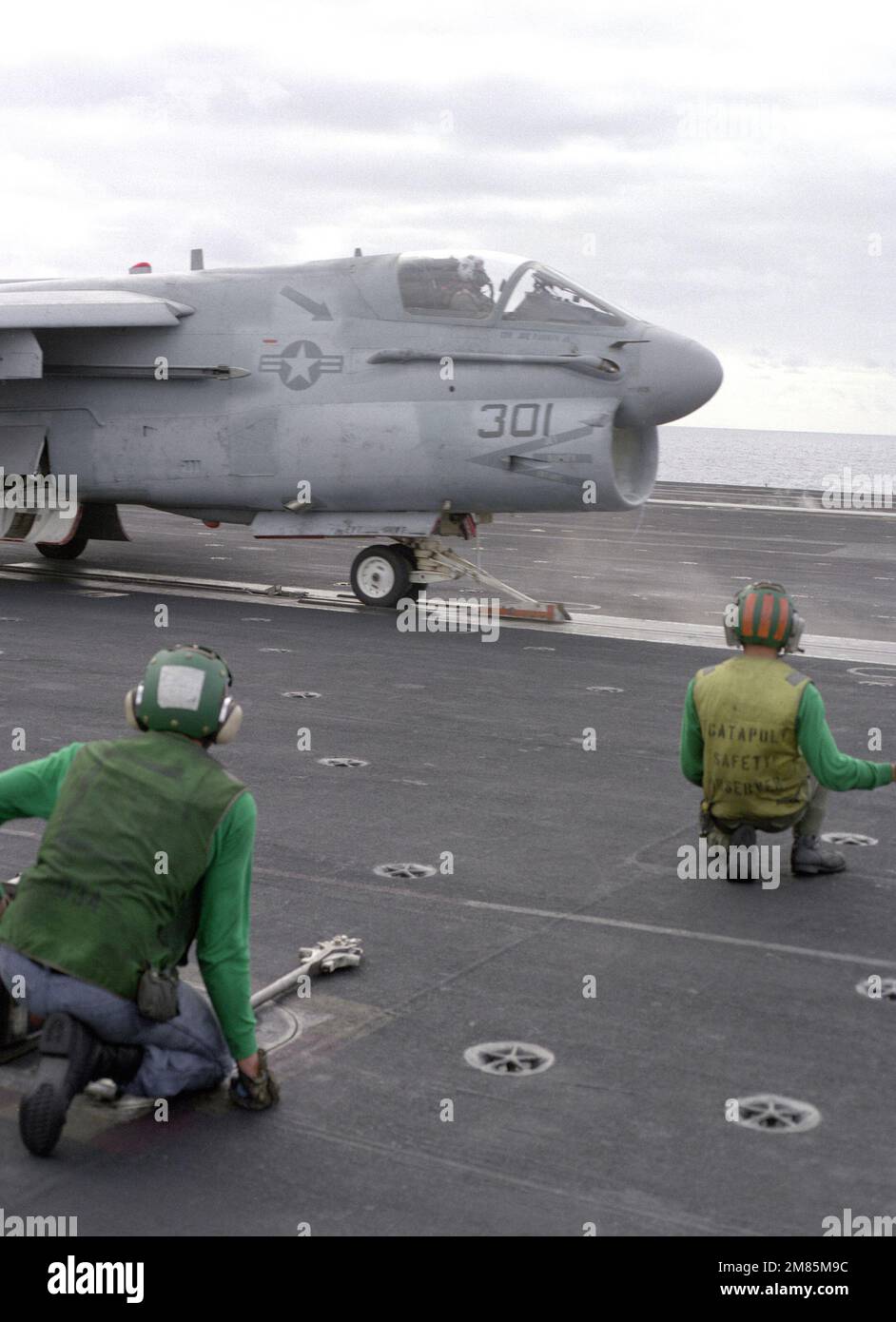 An A-7E Corsair II aircraft is positioned on a catapult during flight ...