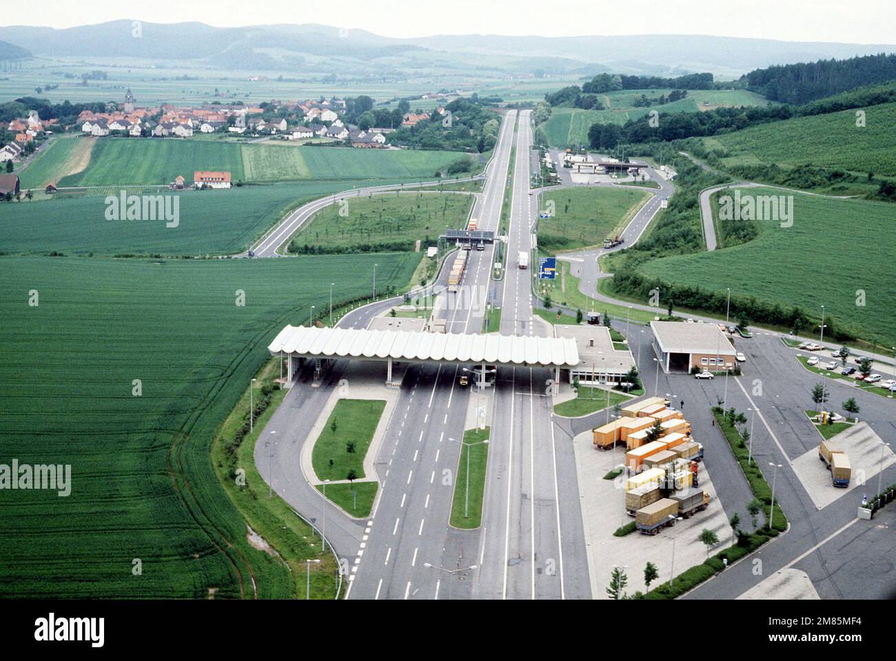 An aerial view of the highway which crosses at the border between East ...