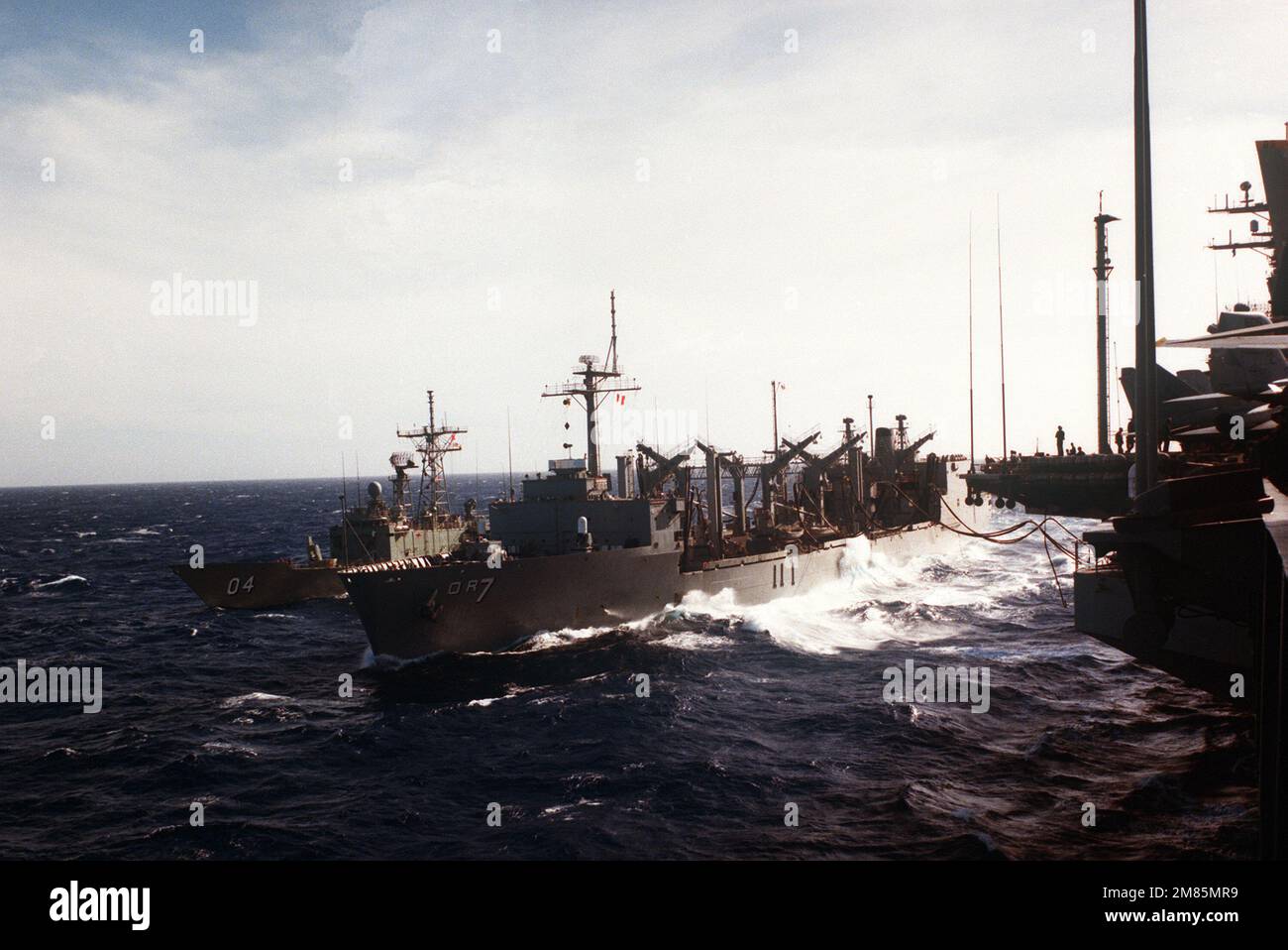 A port bow view of the replenishment oiler USS ROANOKE (AOR-7 ...