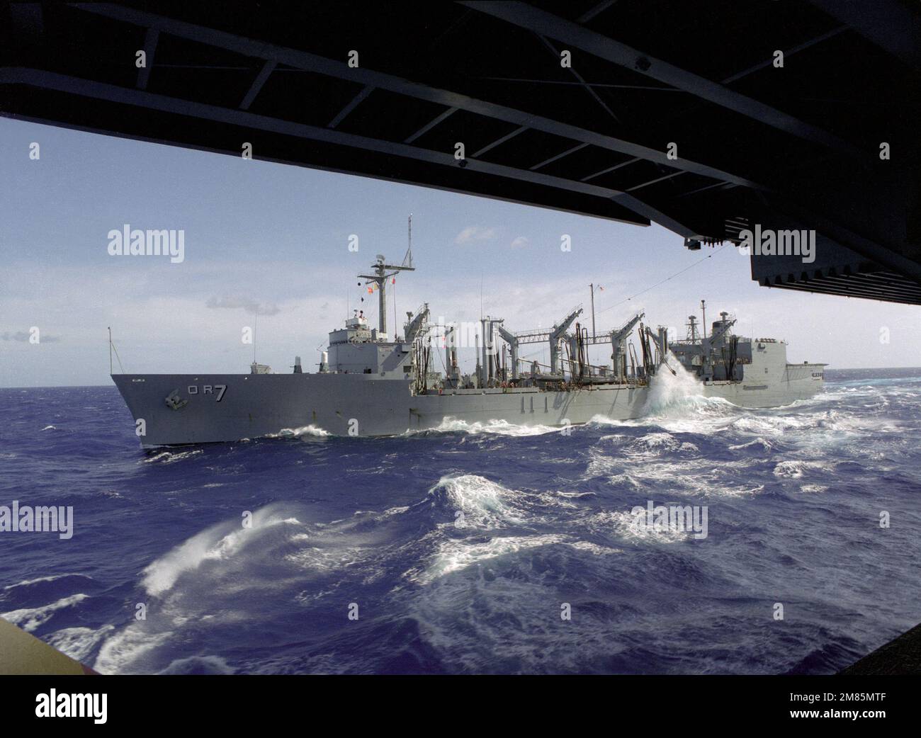 A port bow view of the replenishment oiler USS ROANOKE (AOR-7 ...