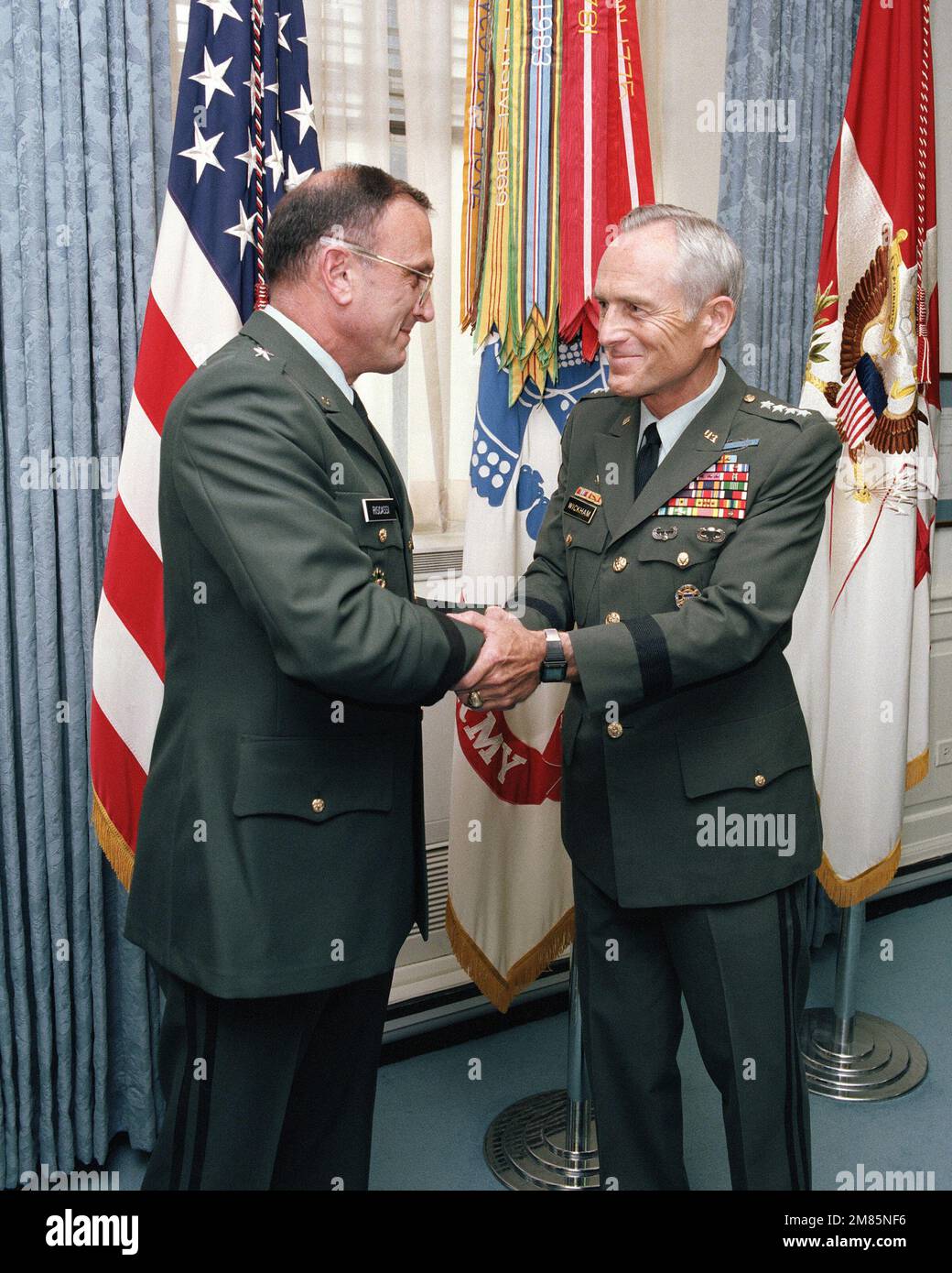 Army CHIEF of STAFF General John A. Wickham Jr., right, congratulates ...