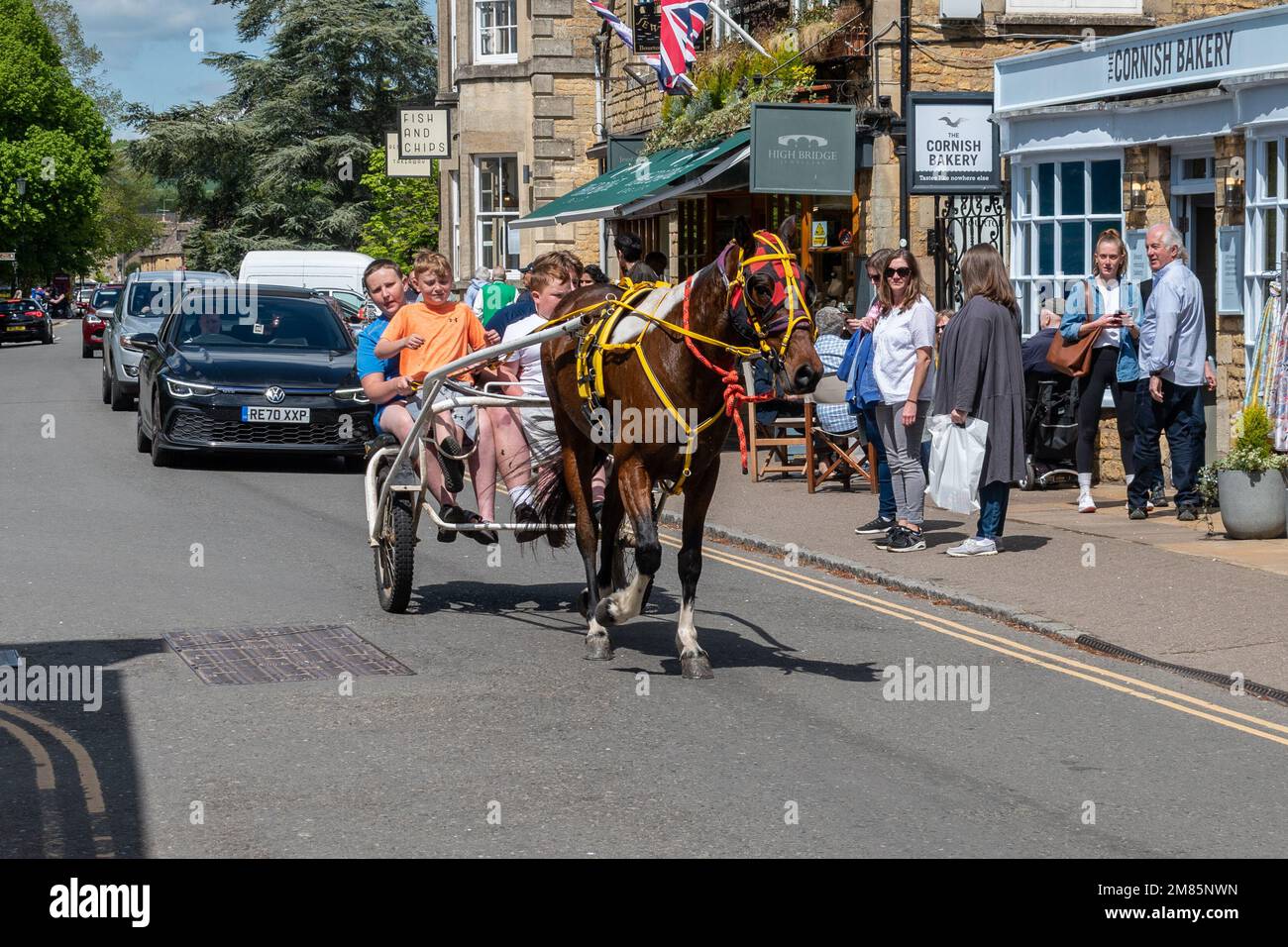 4 young people from the Gypsy-Traveller community passing down the High ...