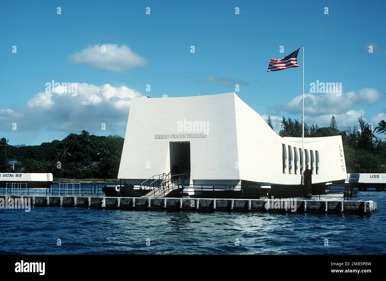 A view of the USS ARIZONA Memorial which spans the sunken hull of the ...
